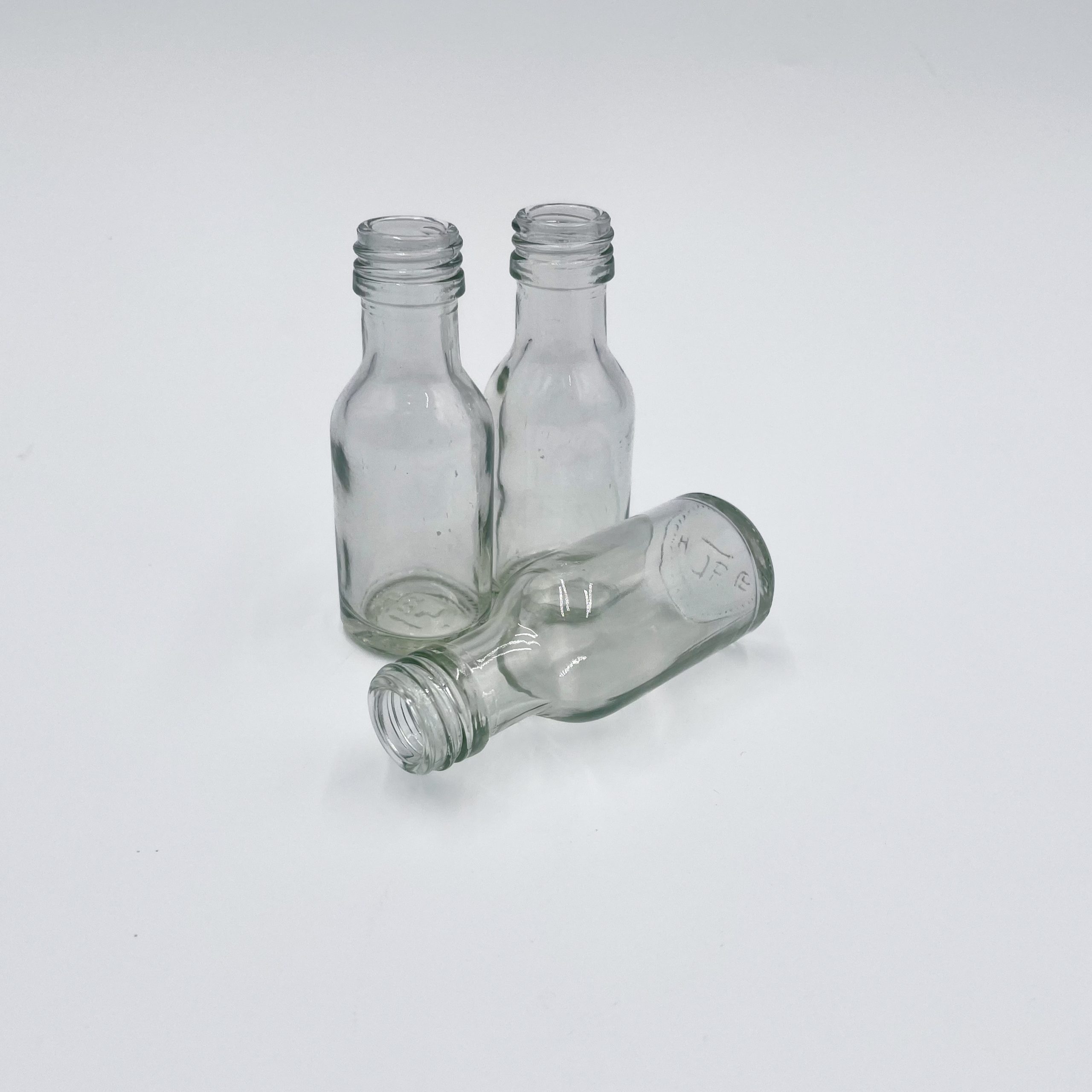 32ml Essence Bottle – Saba with22mm ROPP – Green Cap – Glasspack.lk